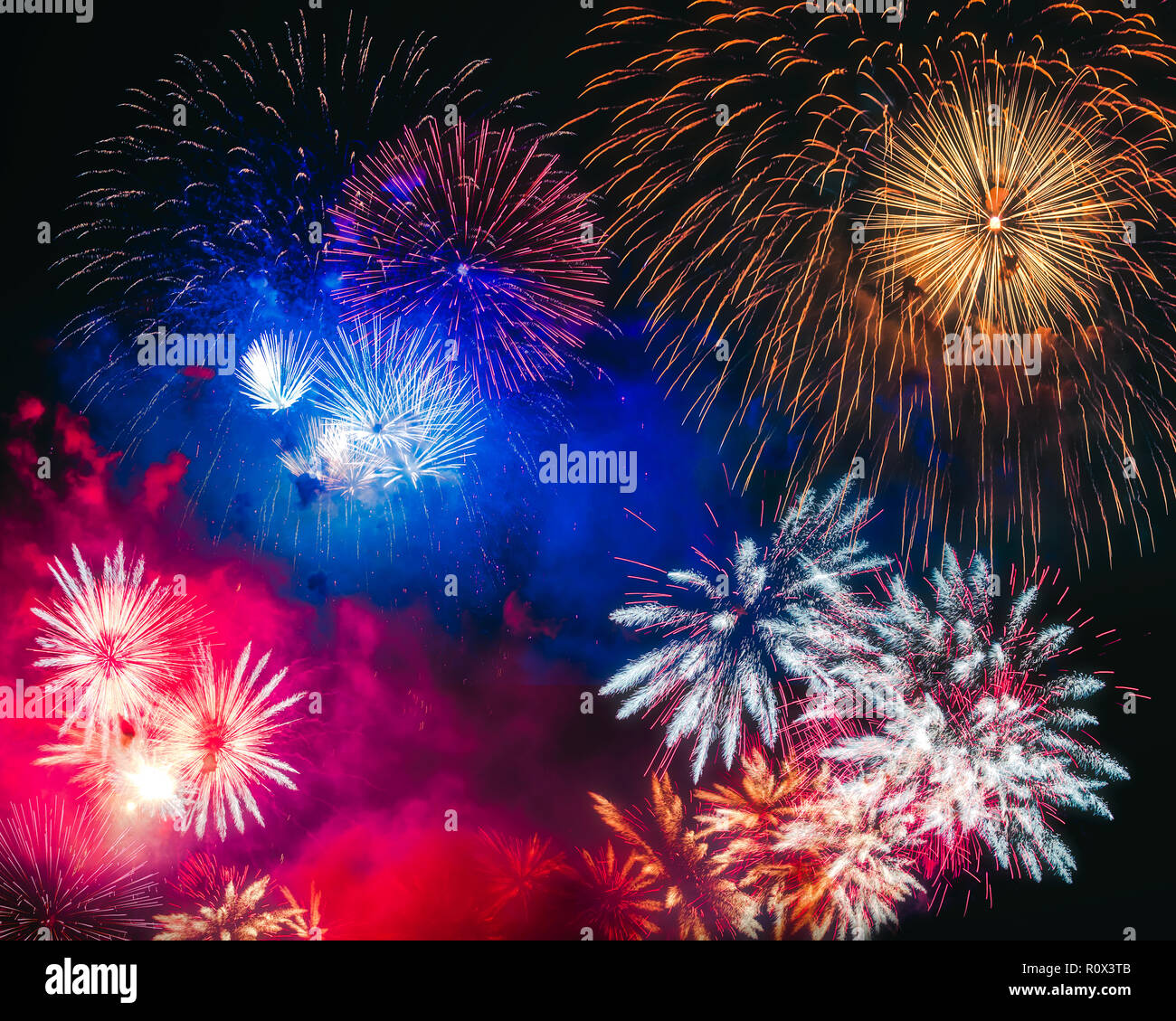 Colorful fireworks explosion on the black background Stock Photo - Alamy