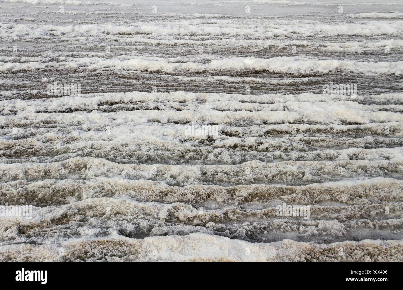 Frosty wave of sea in winter Stock Photo - Alamy