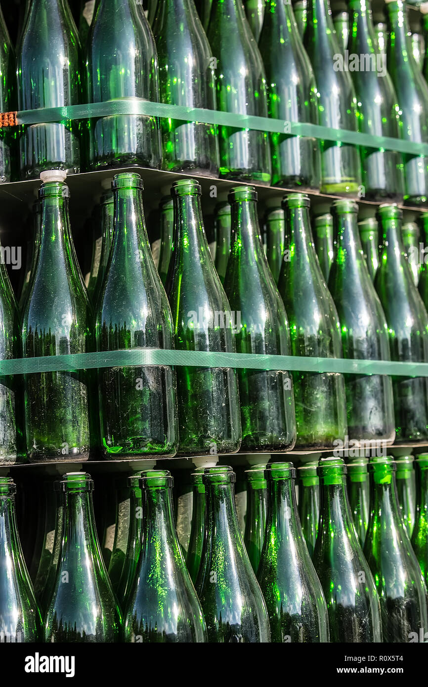 Rows of empty green wine bottles Stock Photo - Alamy