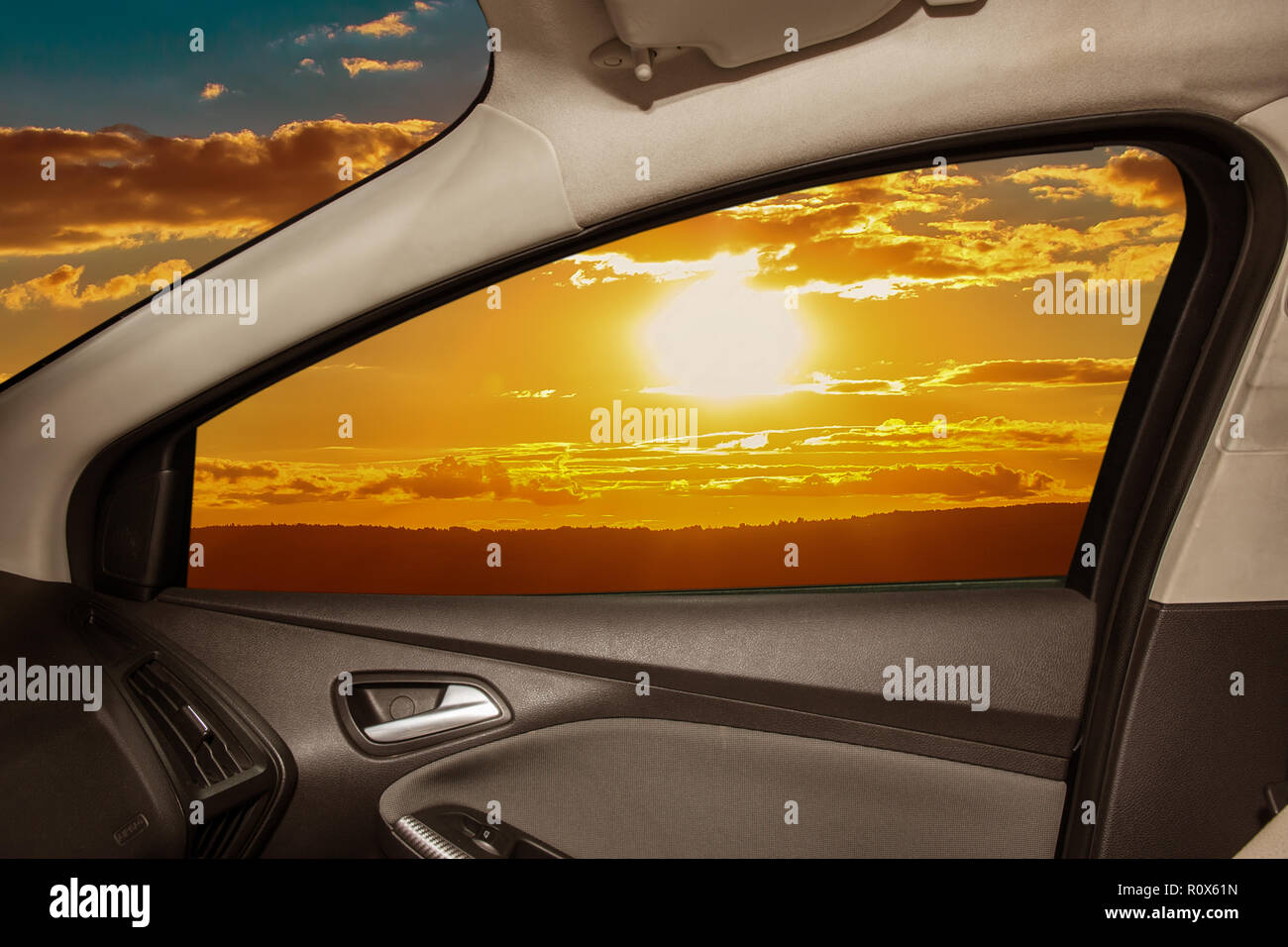 beautiful sunset from the car window Stock Photo - Alamy