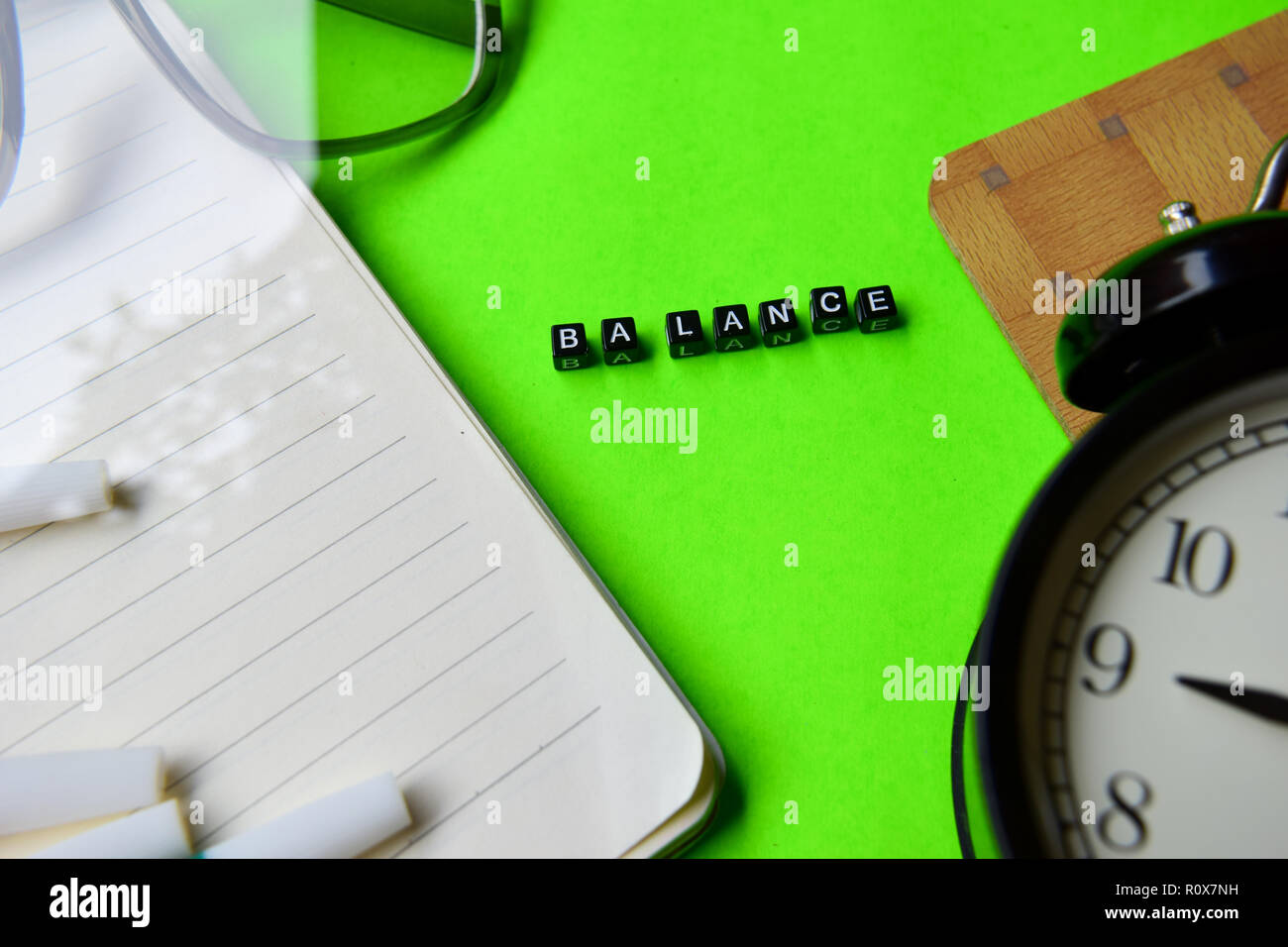 Balance message written on wooden blocks. education and motivation ...