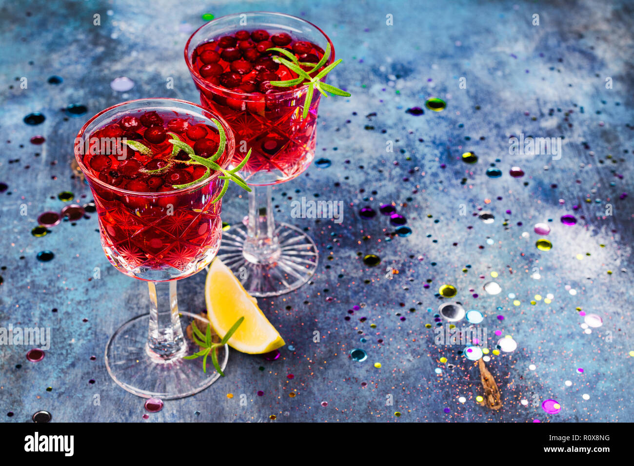 Cranberry cocktail with rosemary Stock Photo - Alamy