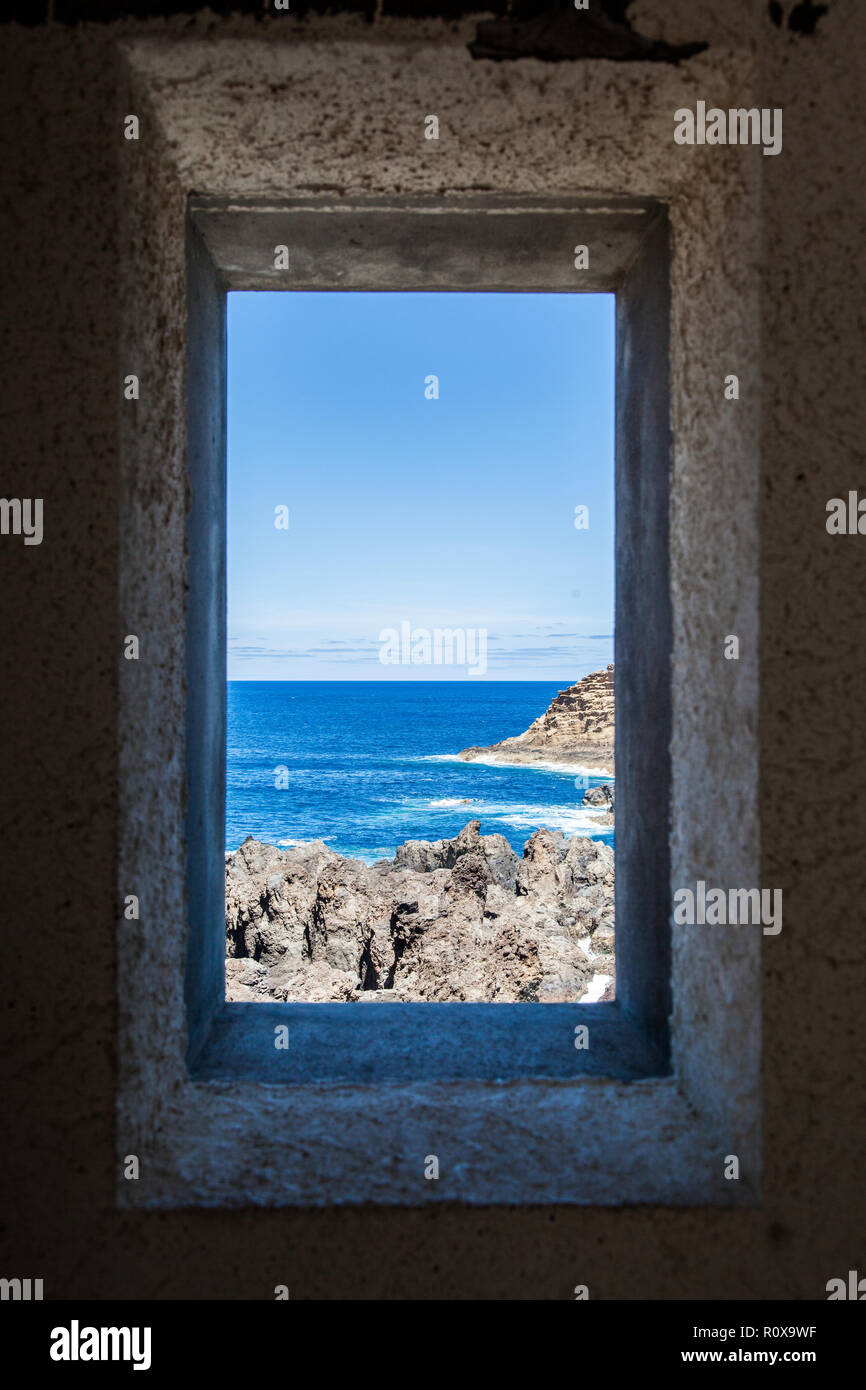 Sea view from a window Stock Photo - Alamy