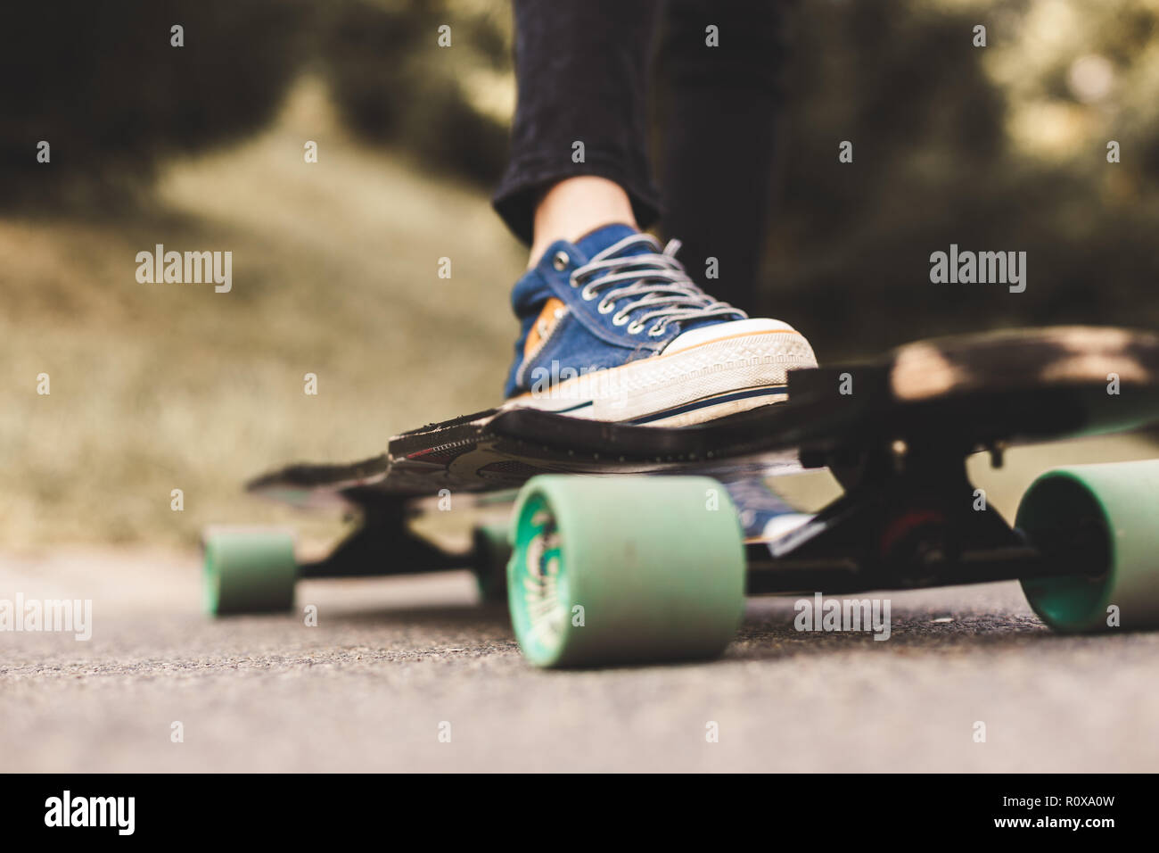 Cute girl on longboard hi-res stock photography and images - Alamy