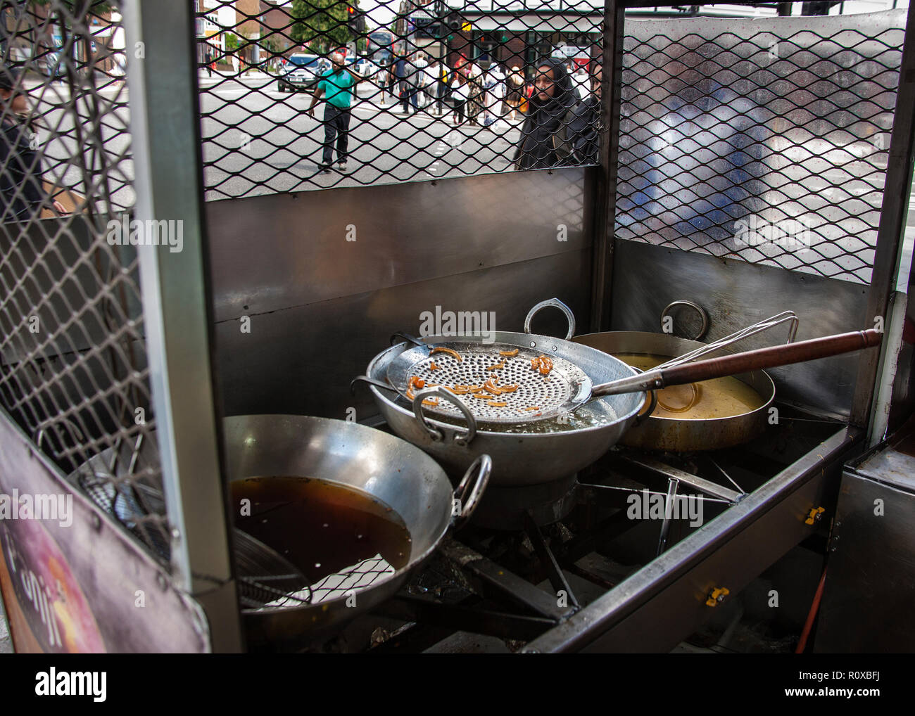 frying samosa's street food southall london Stock Photo - Alamy