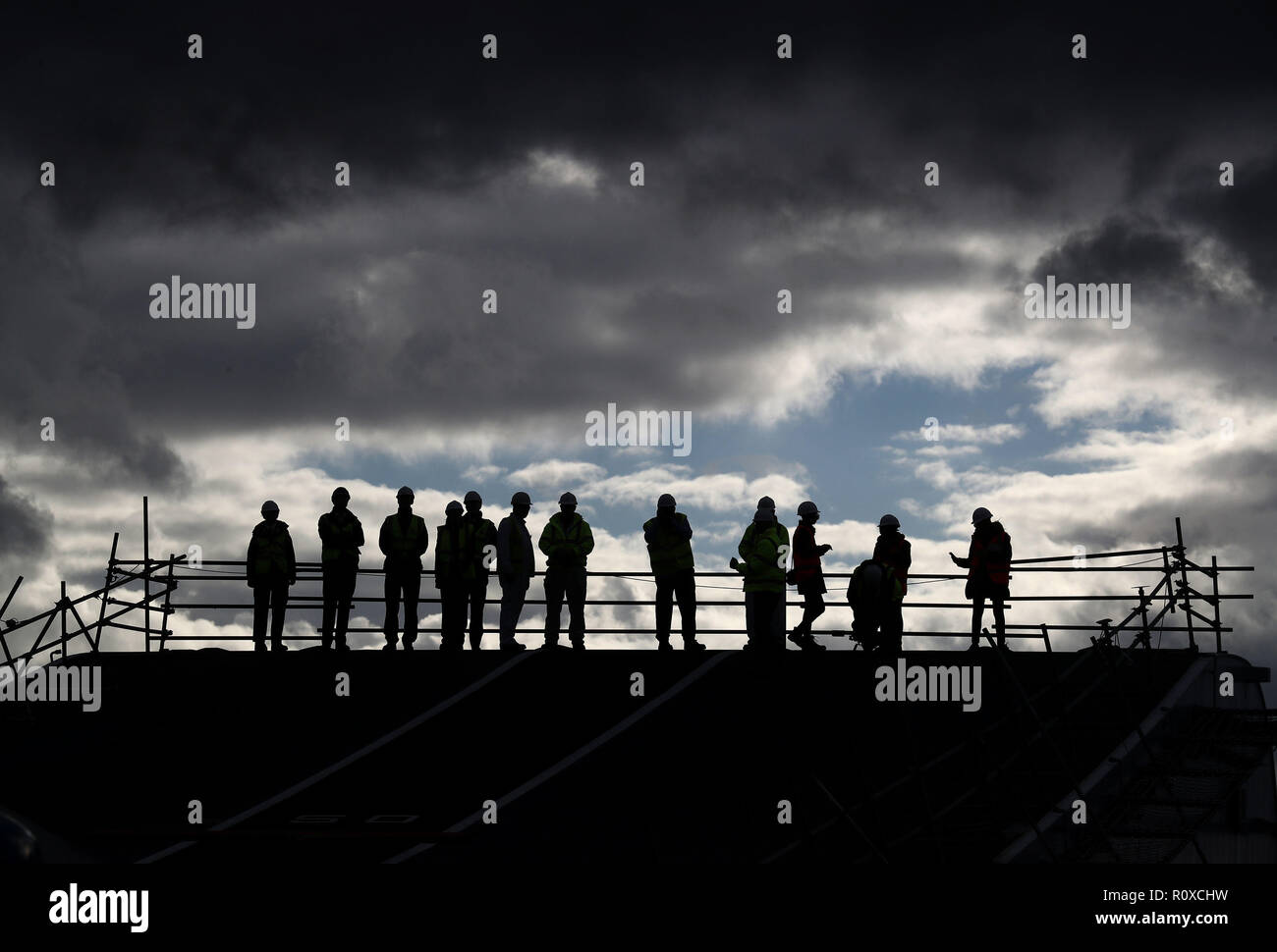 Members of the media view from the ramp area of the flight deck during ...