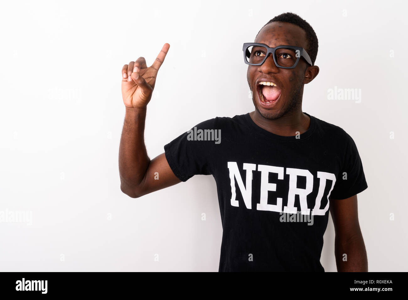 Studio shot of young happy black African geek man with great ide Stock ...