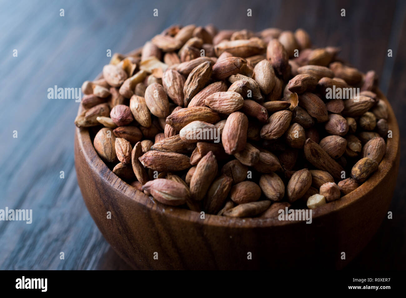 Organic Pistachio Nuts Without Shell in Wooden Bowl. Organic Food Stock ...
