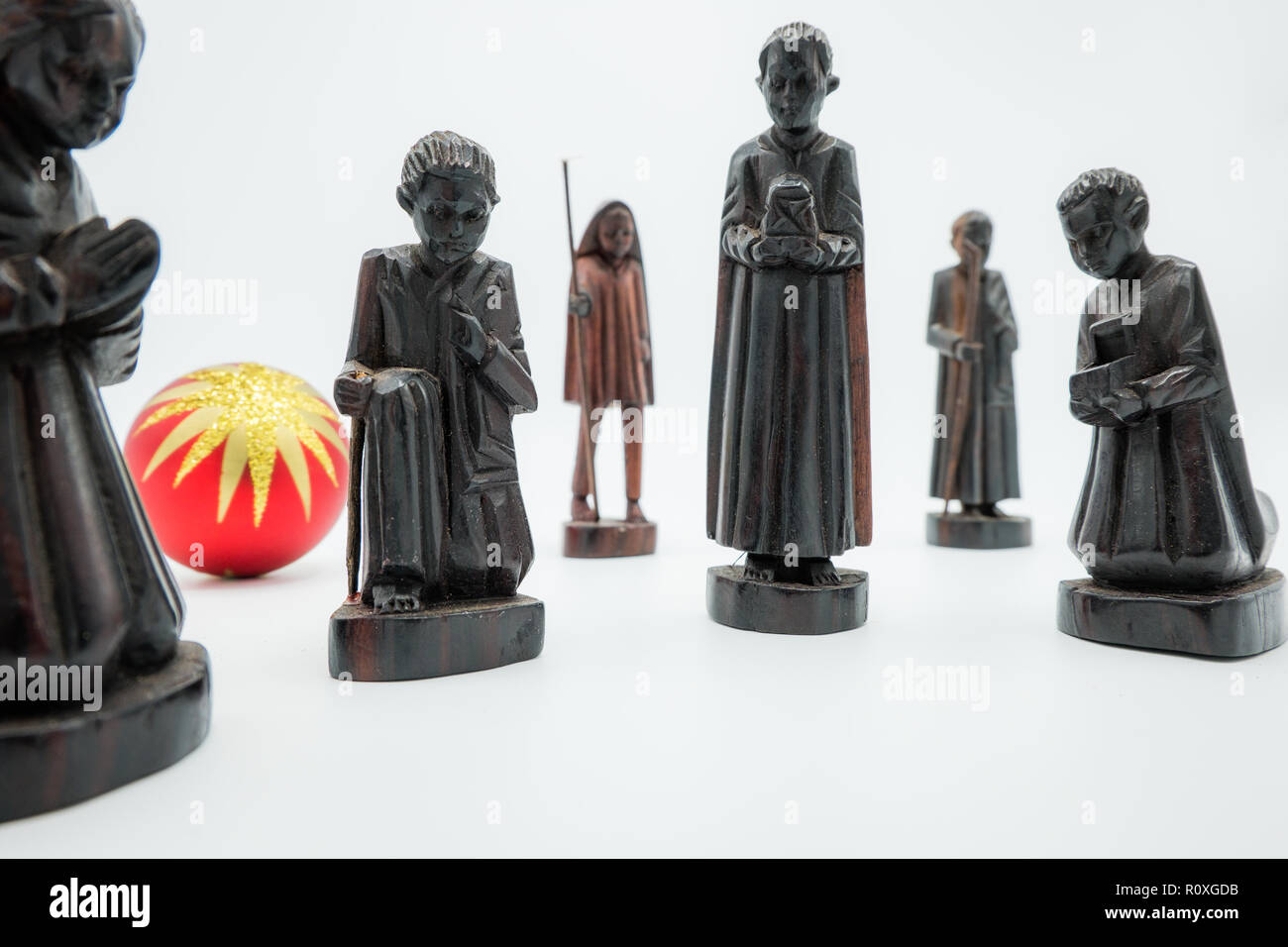 Dark wood Christian nativity scene figures of Biblical Magi isolated on ...