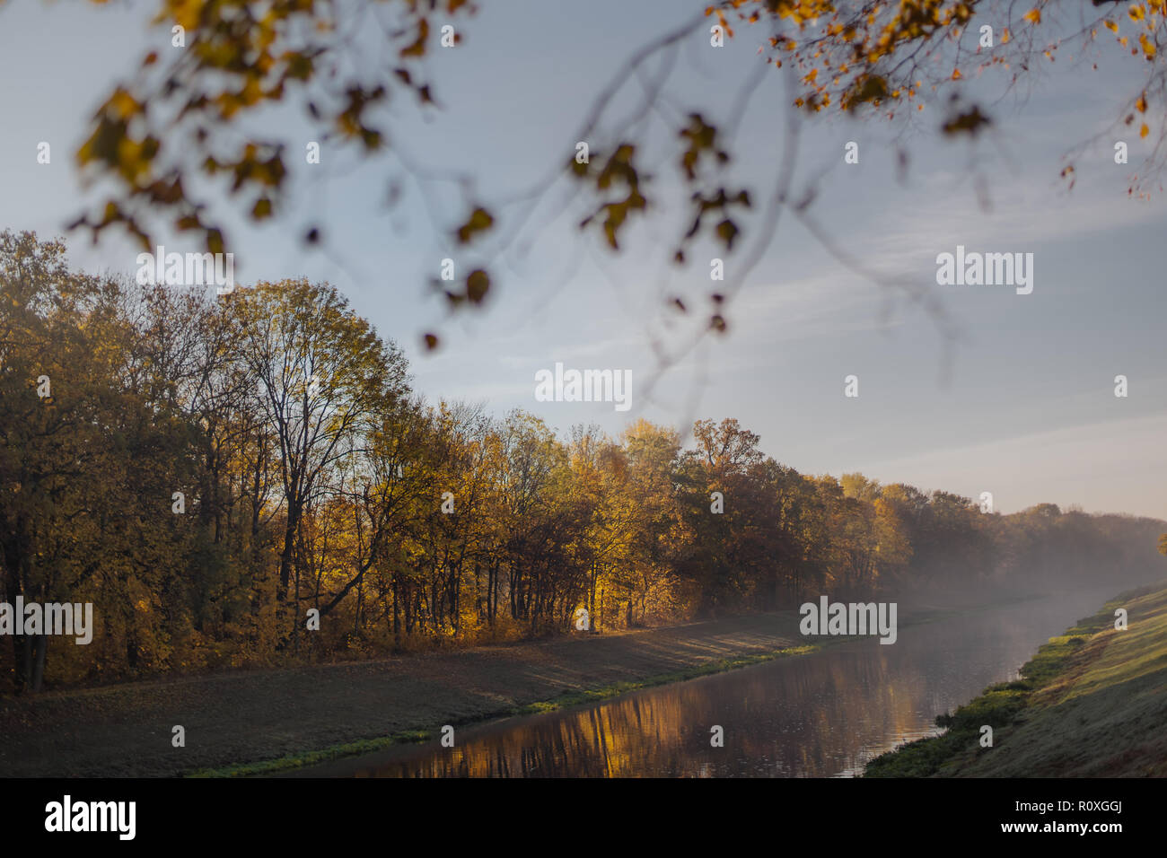 photo of colourful riverside autumn landscape Stock Photo - Alamy