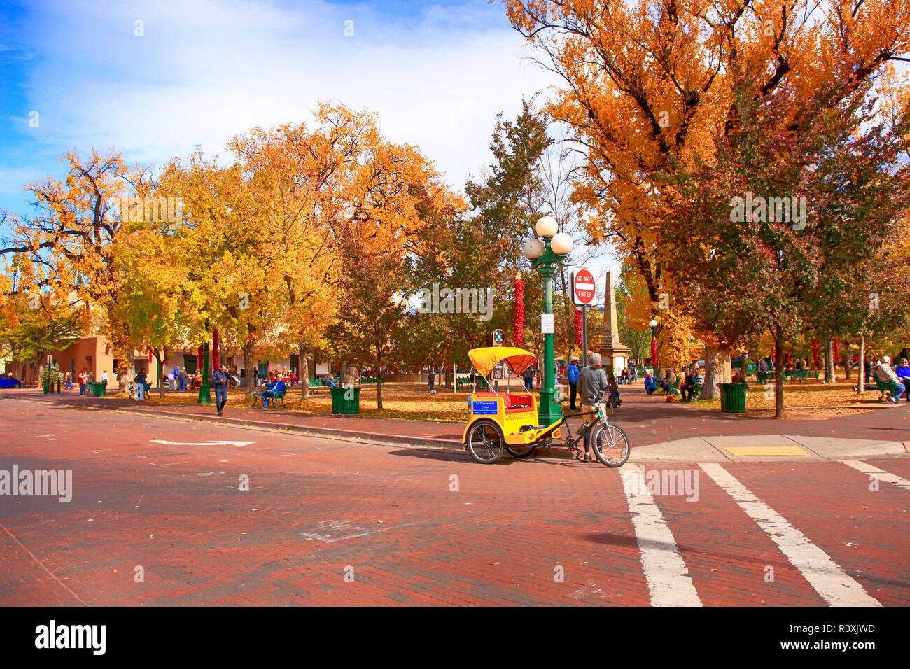People enjoying the Fall colors and temps in the Santa Fe Plaza in ...