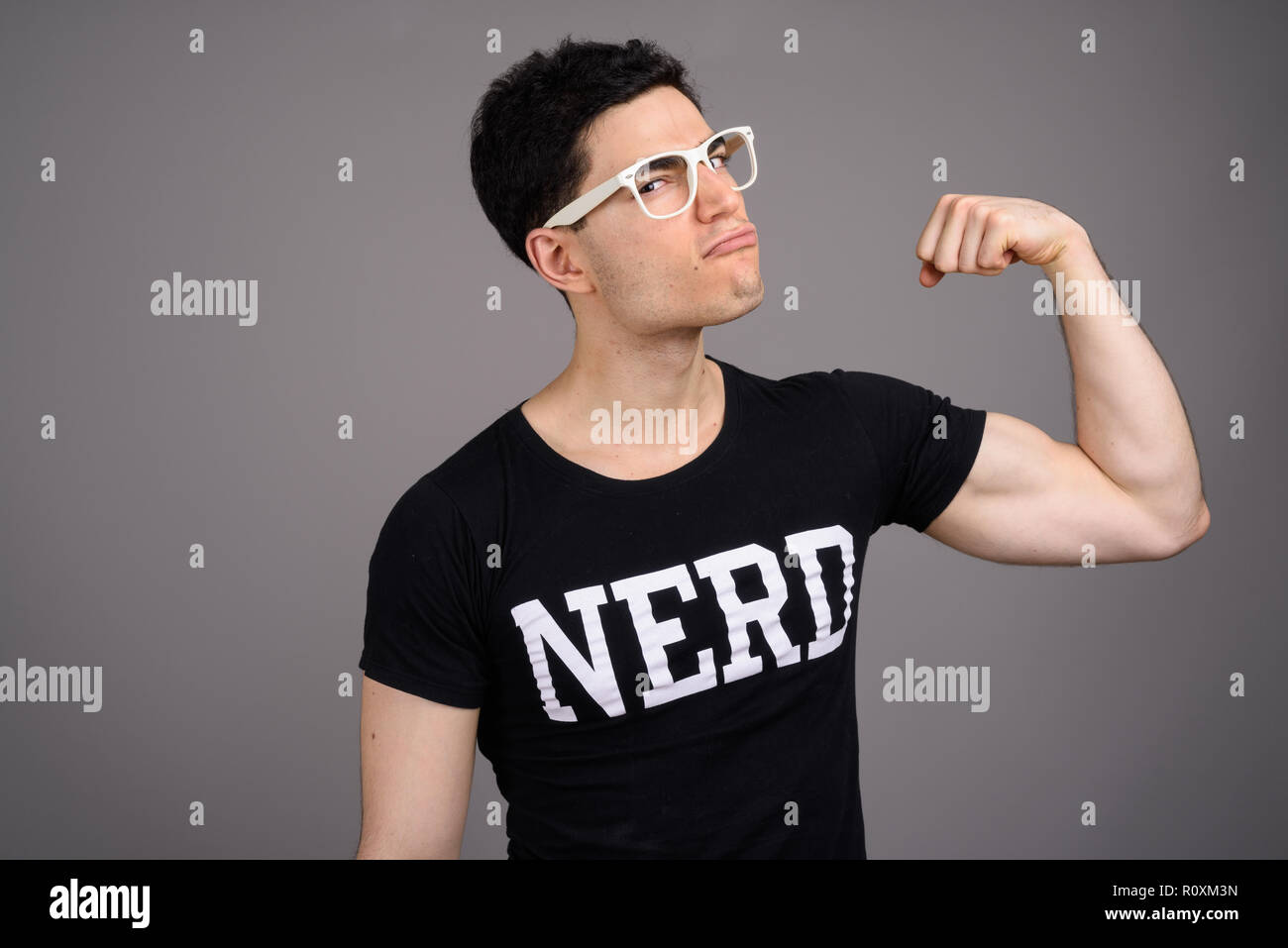 Man flexing muscle black hi-res stock photography and images - Alamy