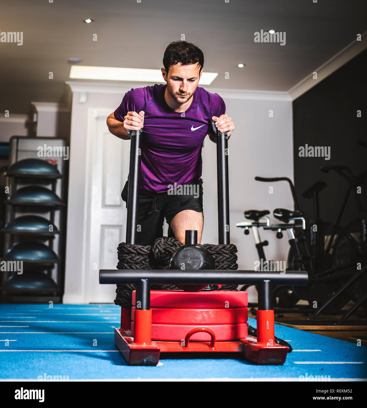 Gym Session PT Stock Photo - Alamy