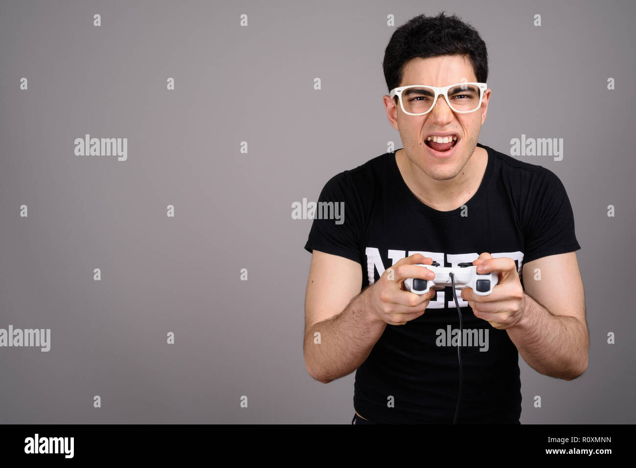 Black gaming controller hi-res stock photography and images - Alamy