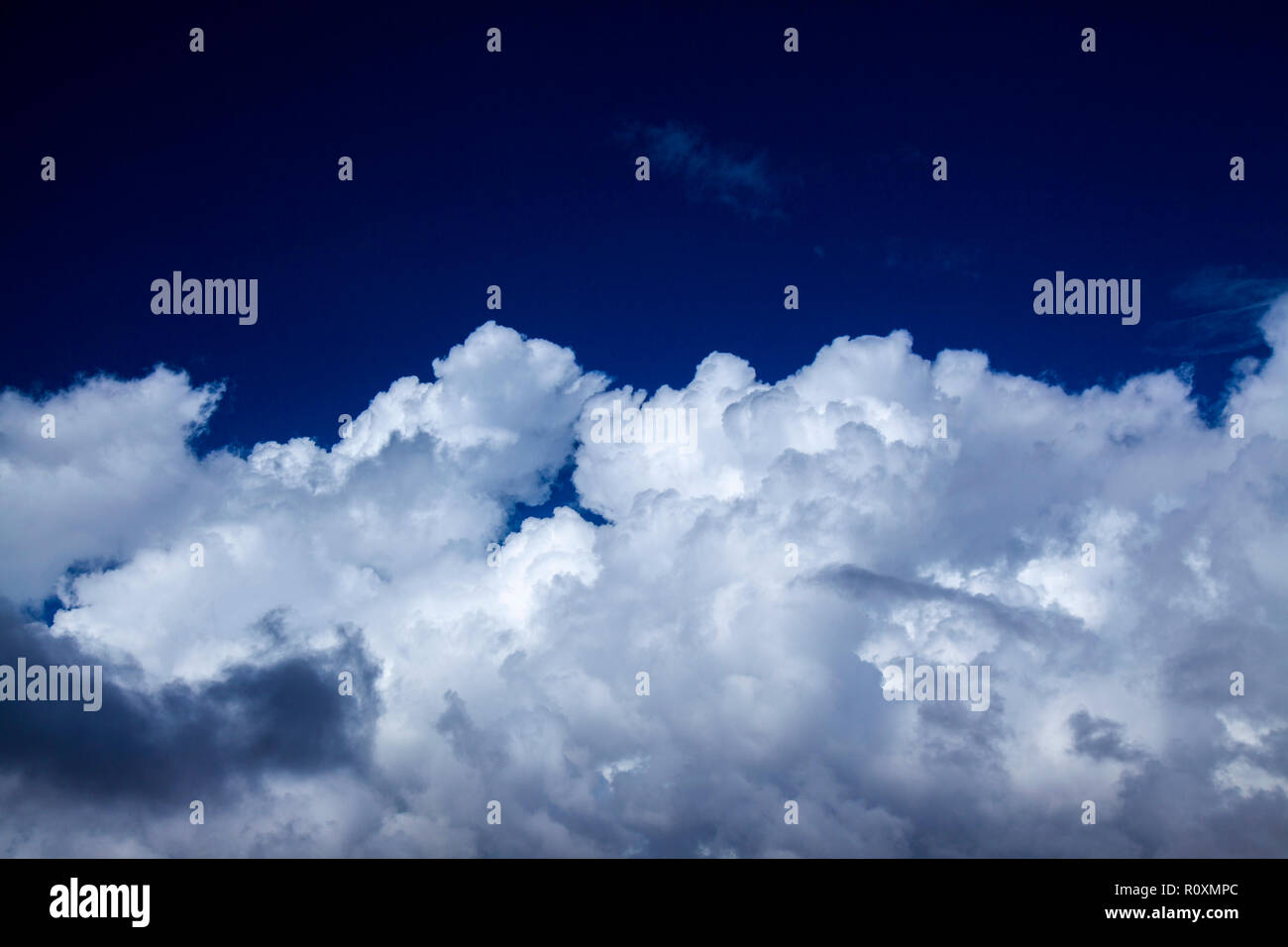 natural cumulus clouds backgroud with towering cumulus Stock Photo - Alamy