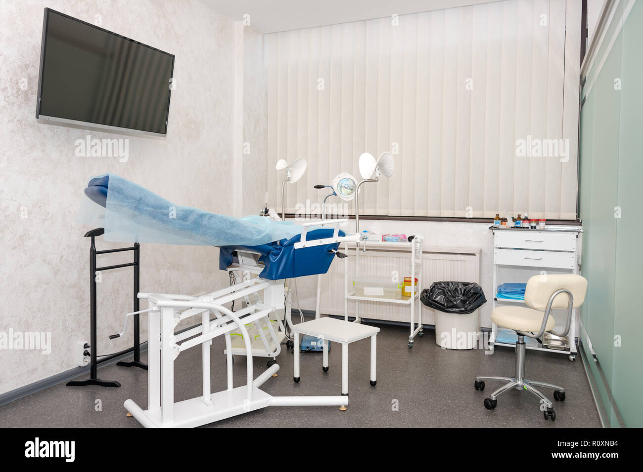 Modern european medical cabinet interior. Gynecological room with chair ...