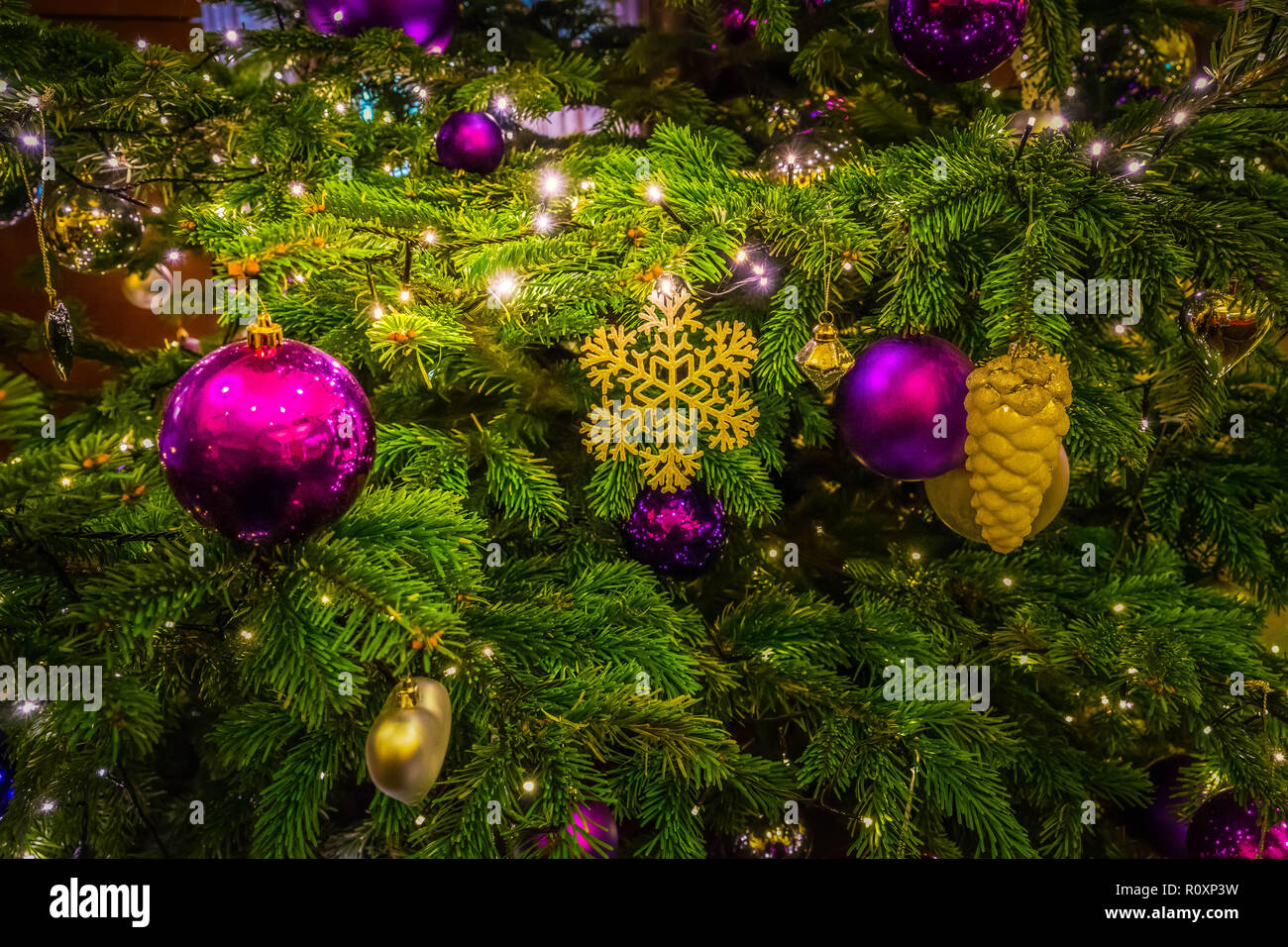 christmas fir tree with decorations Stock Photo - Alamy