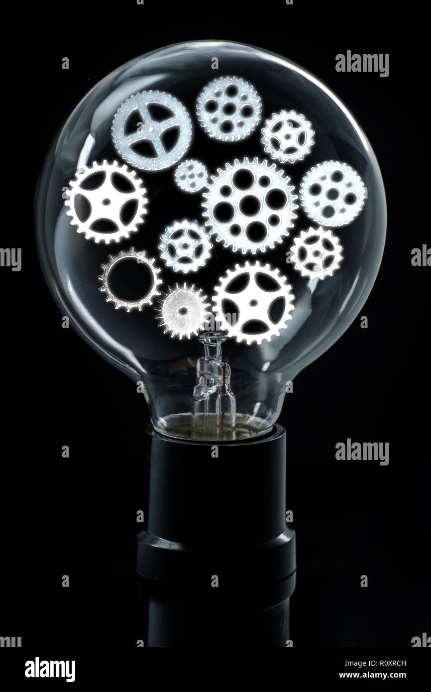 Light bulb with bright gears and cogs for brainstorming ideas concept ...