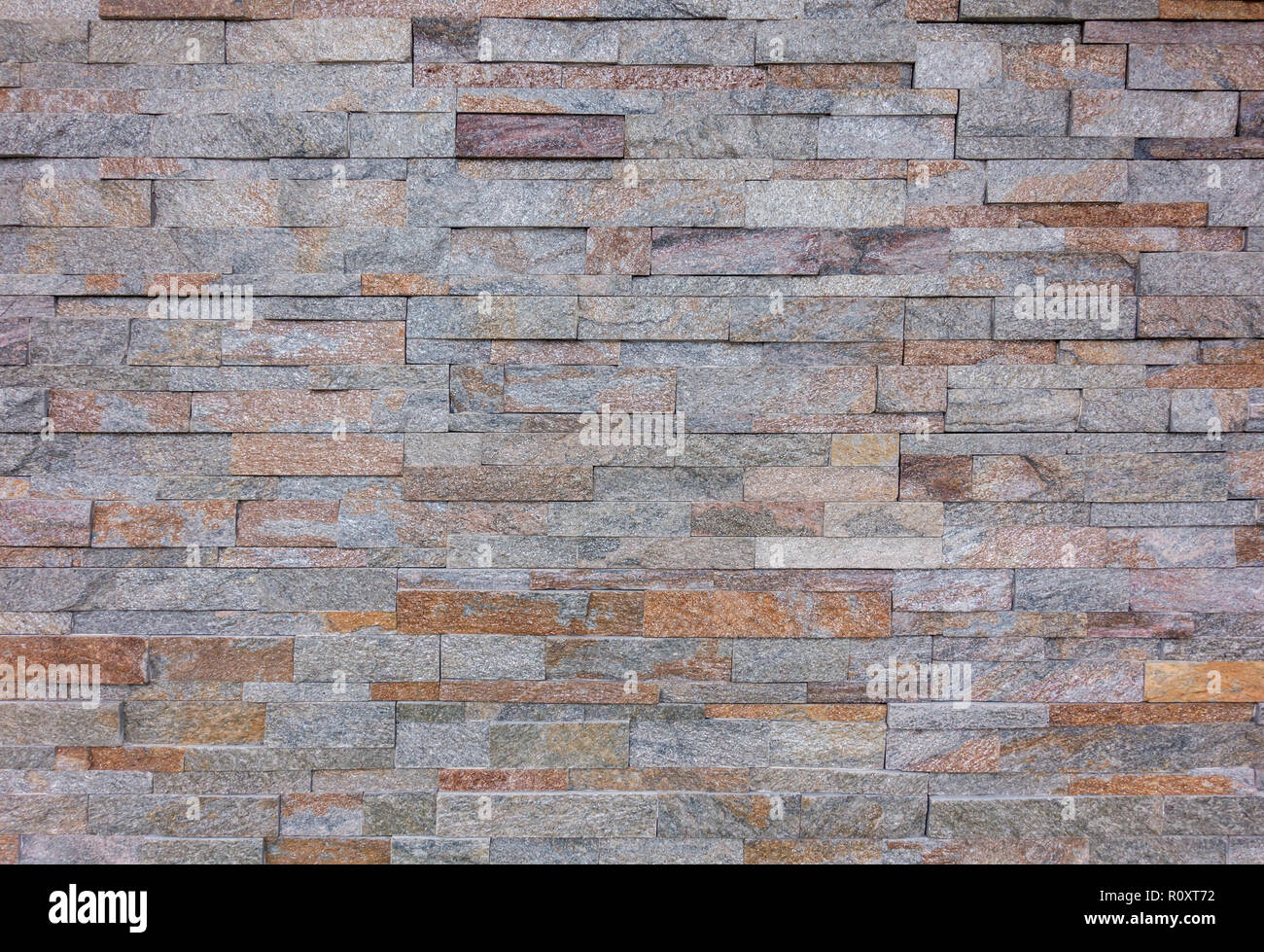 Orange Gray Rock layers wall for texture background Stock Photo - Alamy