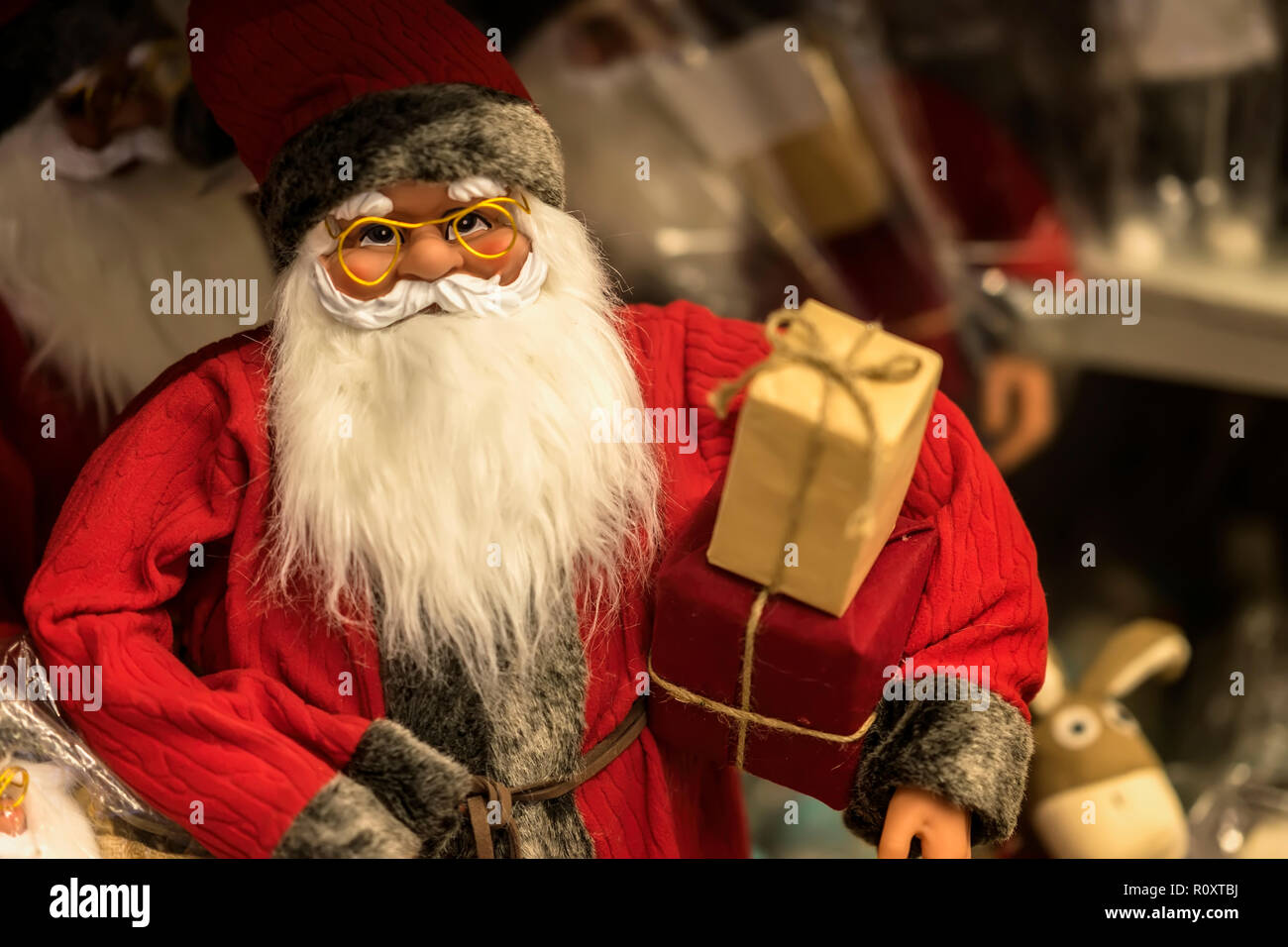 Happy toy Santa Claus. Christmas concept with gifts in boxes Stock ...