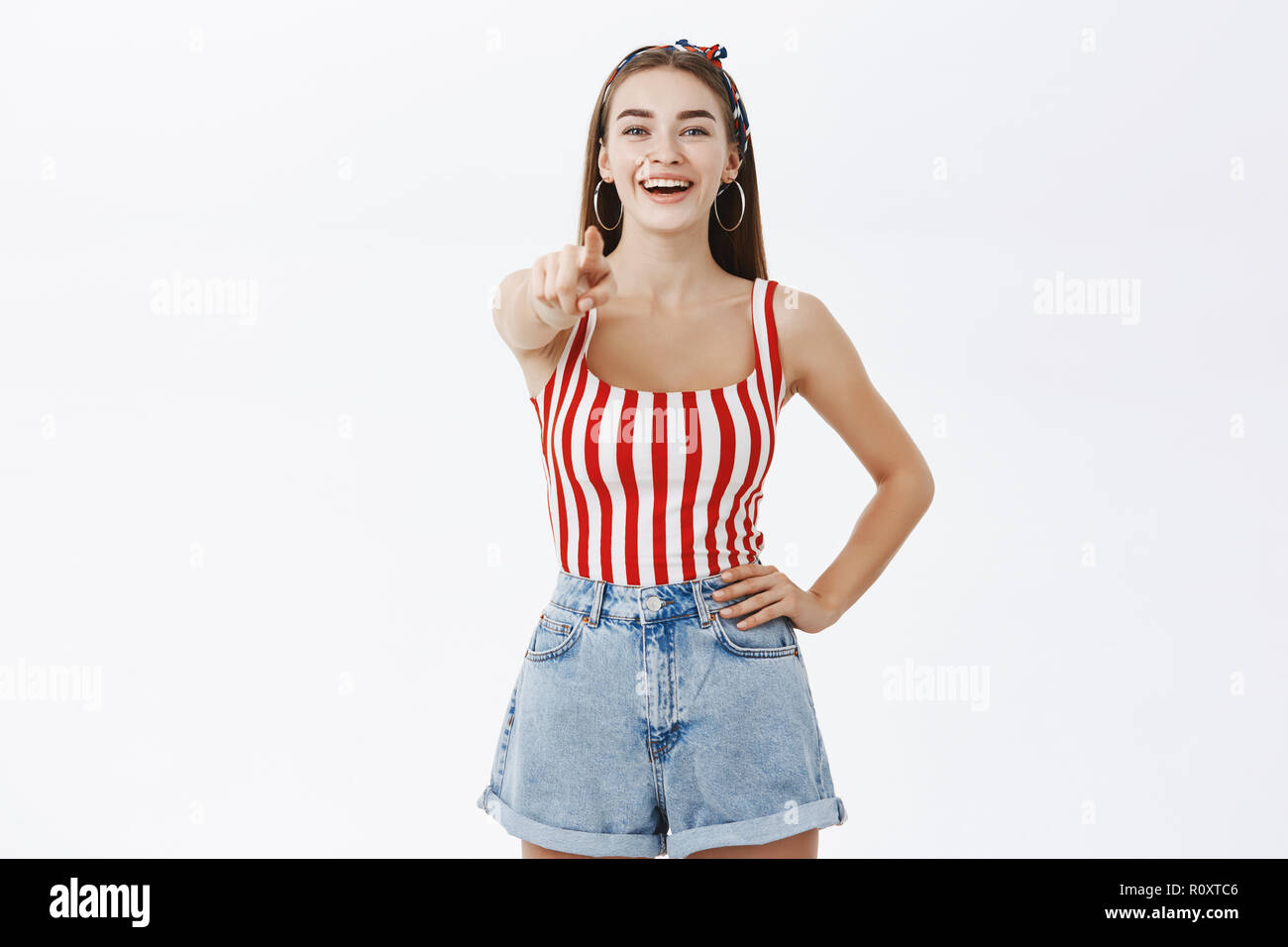 Girl laughing at us. Portrait of joyful arrogant stylish european ...