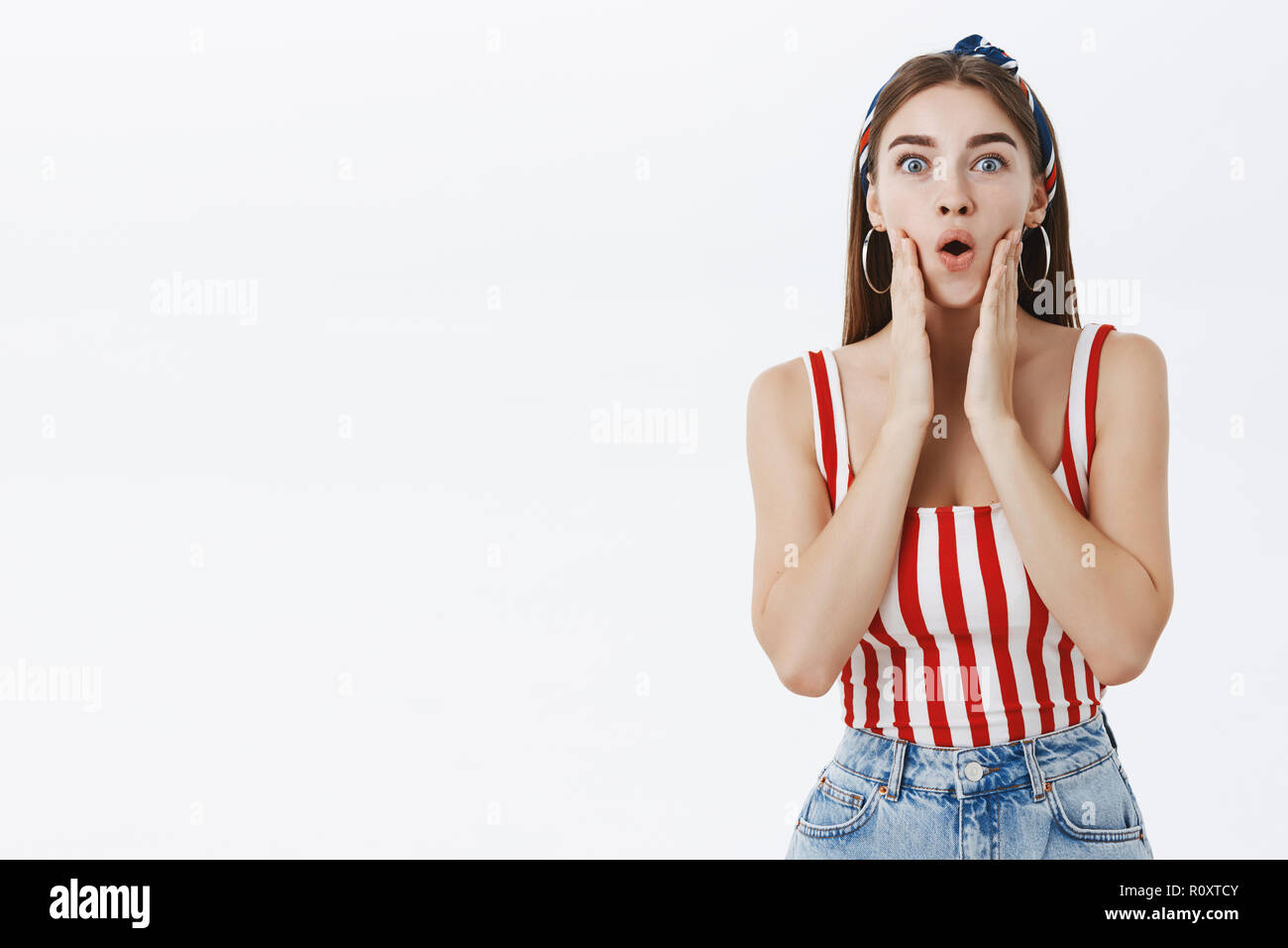 Oh wow that is awesome. Portrait of surprised and amazed stylish young ...