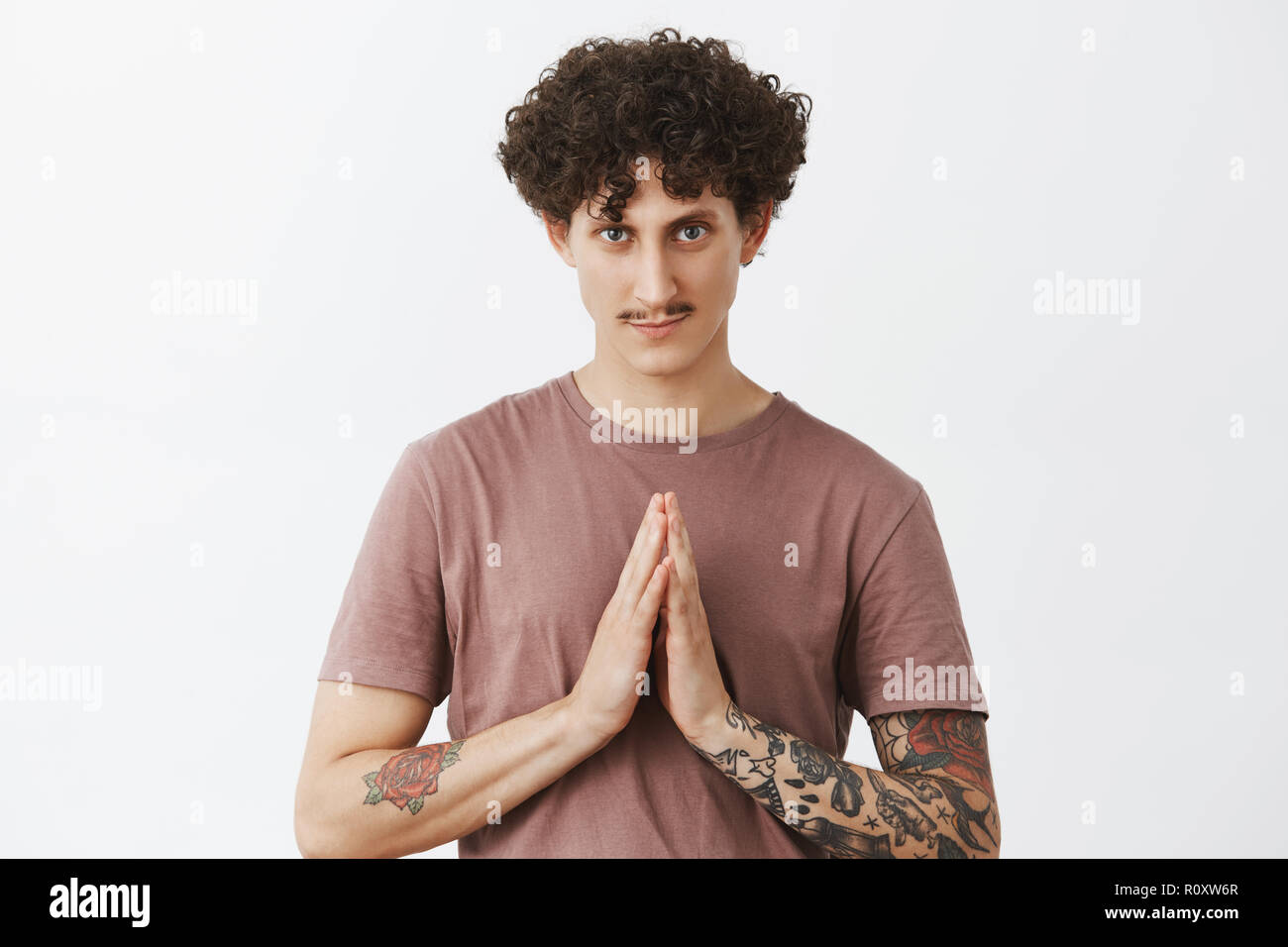 Namaste friends. Portrait of determined and mysterious attractive ...