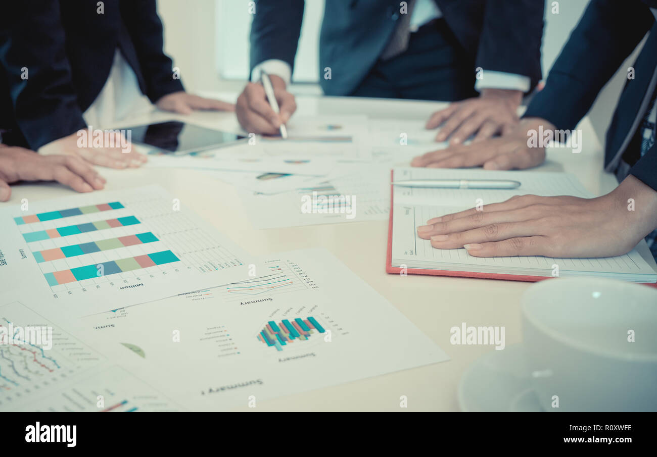 Business Data Chart and report on meeting table Stock Photo - Alamy