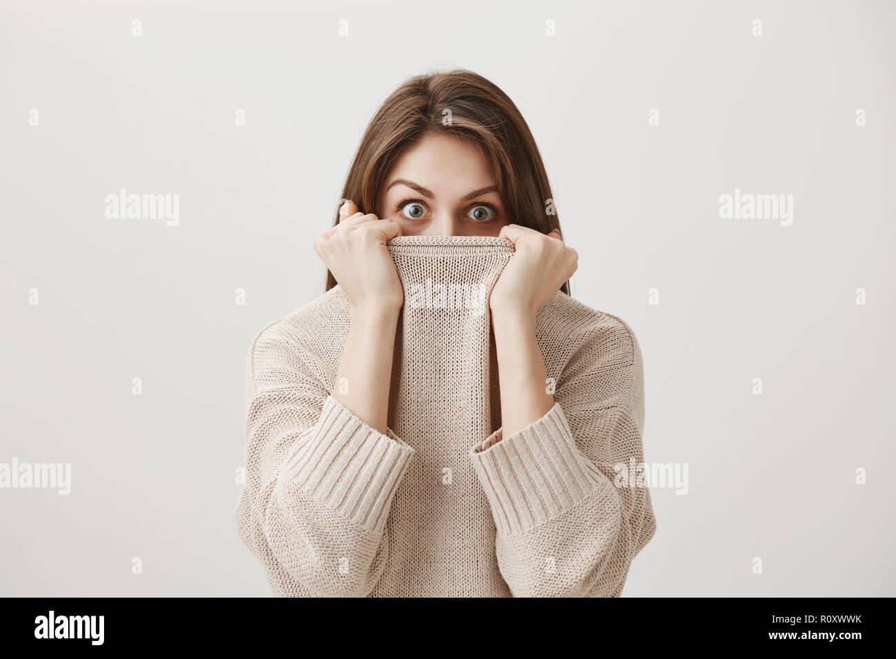 Woman hears terrifying story making her tremble from fear. Portrait of ...