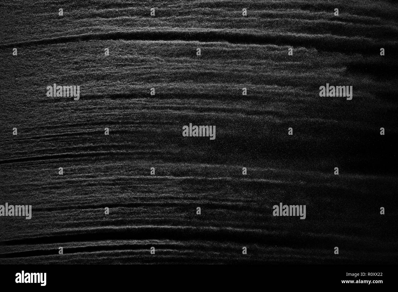 Freeze motion of white particles on black background. Powder explosion ...