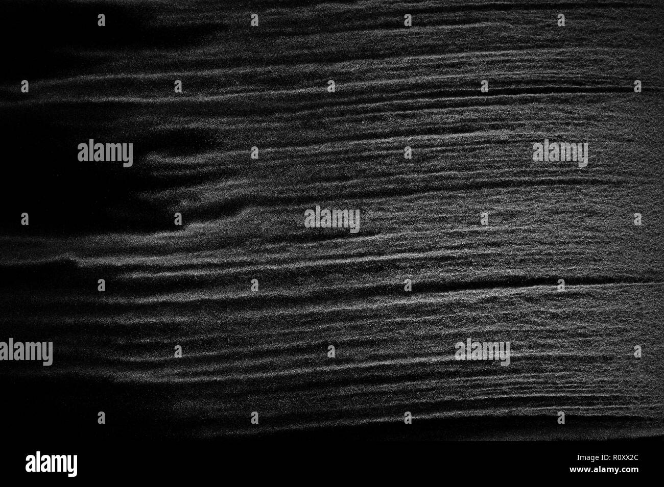 Freeze motion of white particles on black background. Powder explosion ...