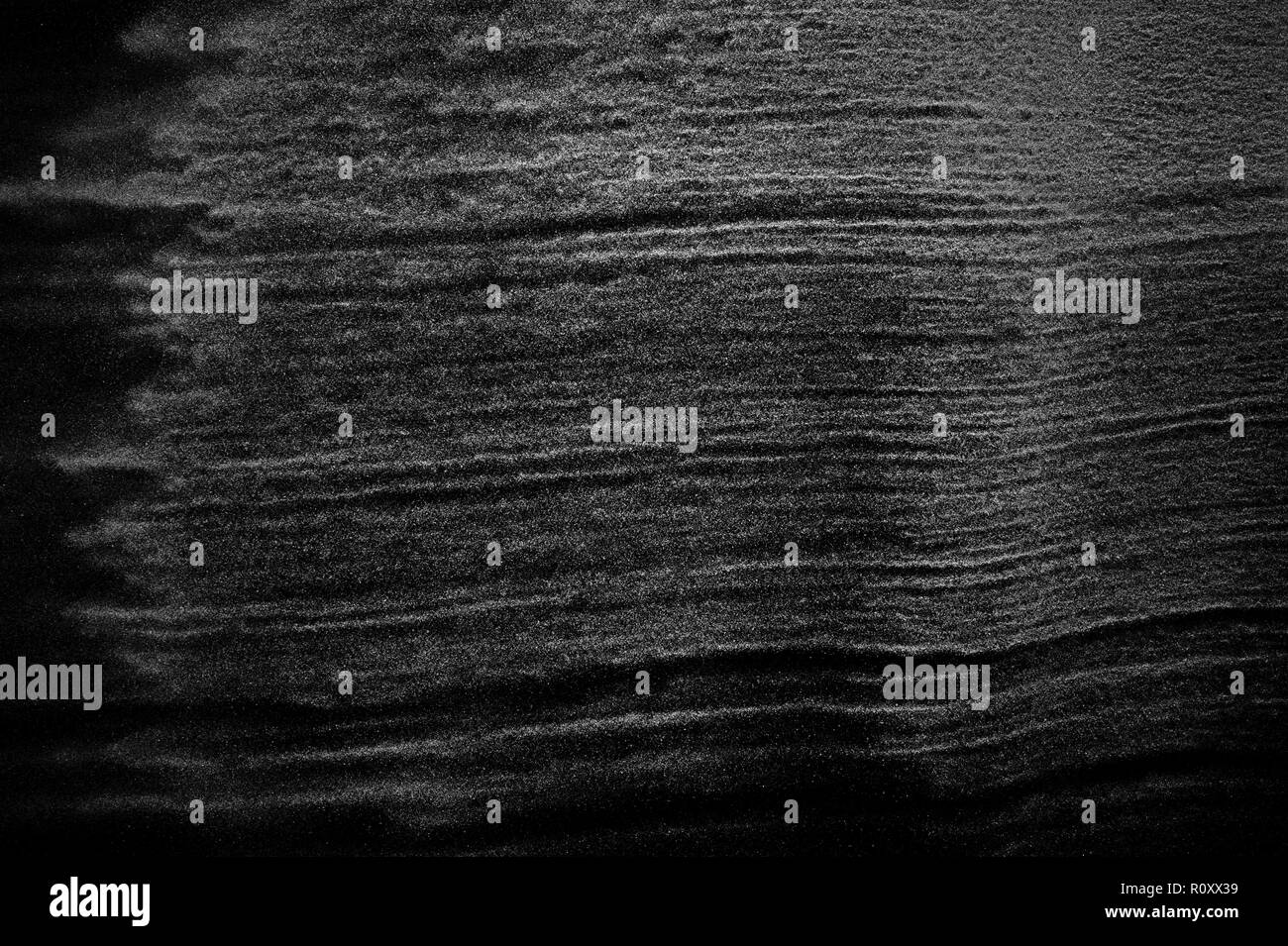 Freeze motion of white particles on black background. Powder explosion ...