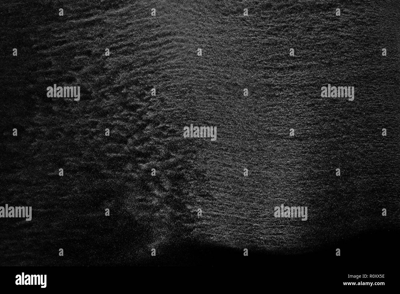 Freeze motion of white particles on black background. Powder explosion ...