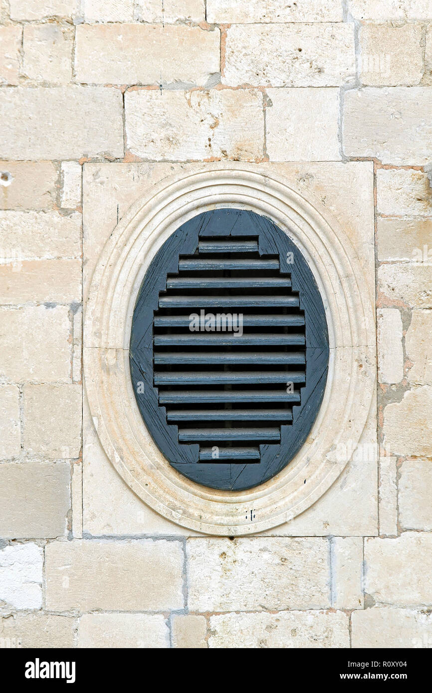 Exterior View of Oval Window With Blinds Stock Photo - Alamy