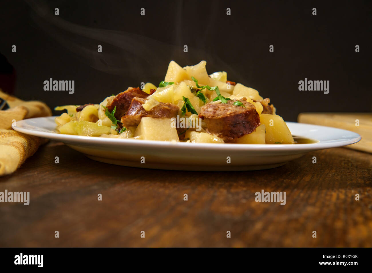 Hearty German Oktoberfest stew with beer bratwurst shredded cabbage and ...