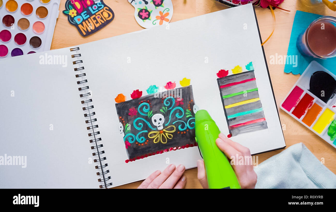 Step by step. Flat lay. Baker drying a watercolor sketch of a cake with ...