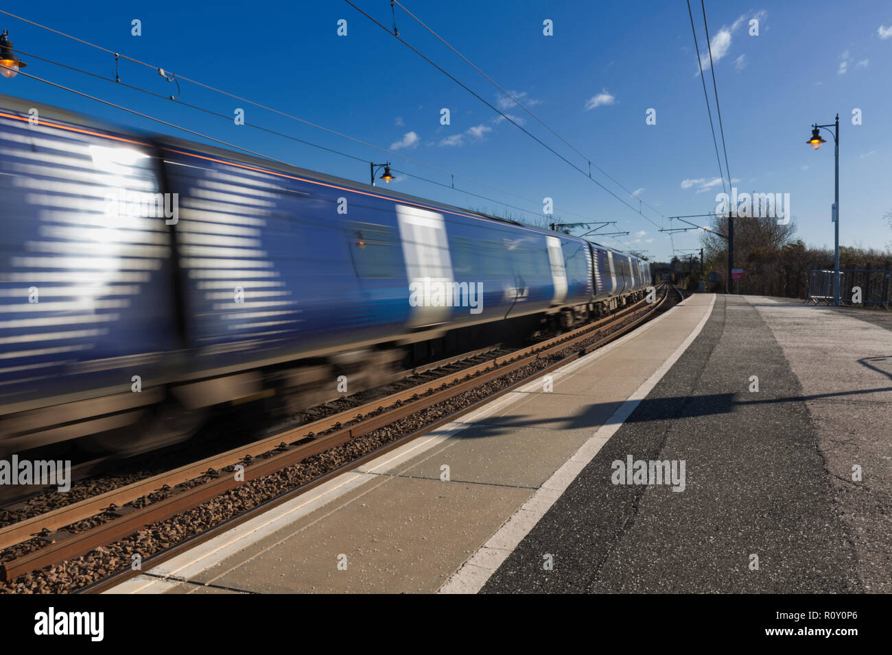 A Scotrail class 380 electric train departing Troon railway station ...