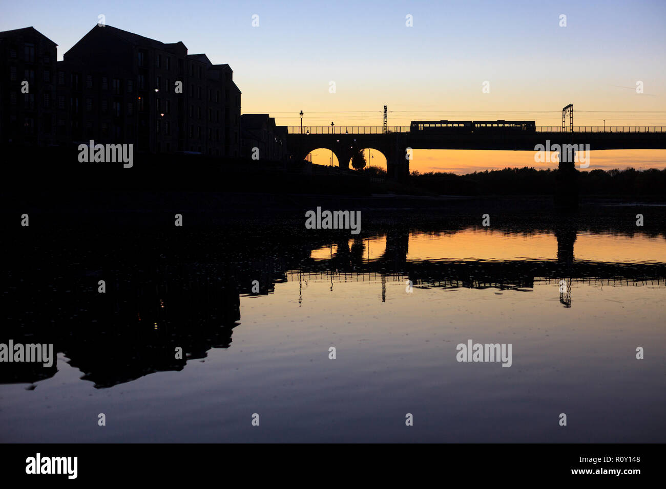 A Arriva Northern Rail class 142 pacer train crossing Carlisle Bridge ...