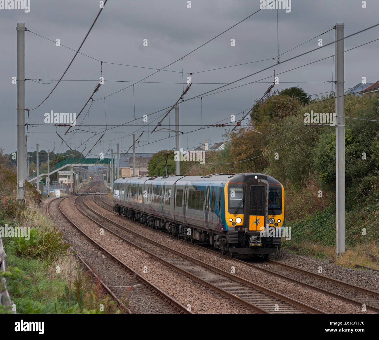 A transpennine Express class 350 electric train passing hest bank on ...