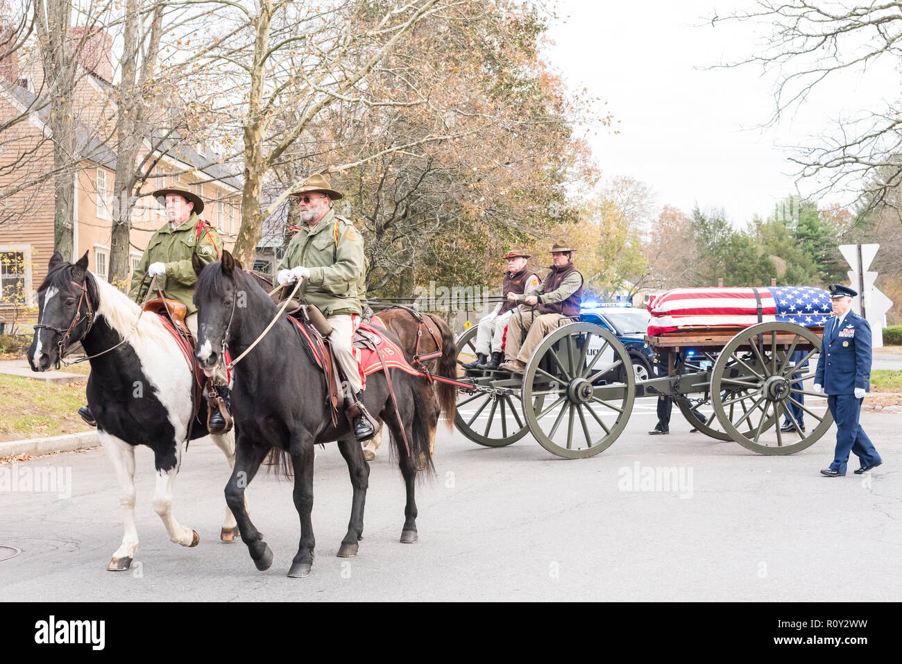 General L. Scott Rice accompanies the horse drawn carriage carrying the ...