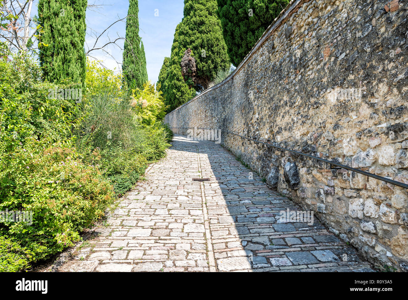 Via San Damiano street, road, stone walkway, path pedestrian way at ...