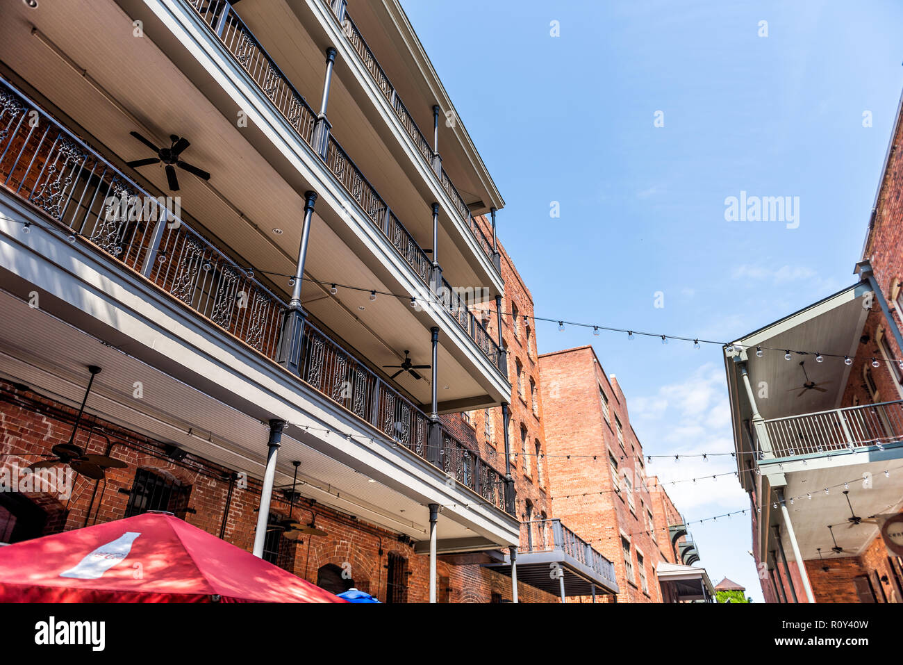 Montgomery, USA - April 21, 2018: Brick buildings looking up on Alley ...