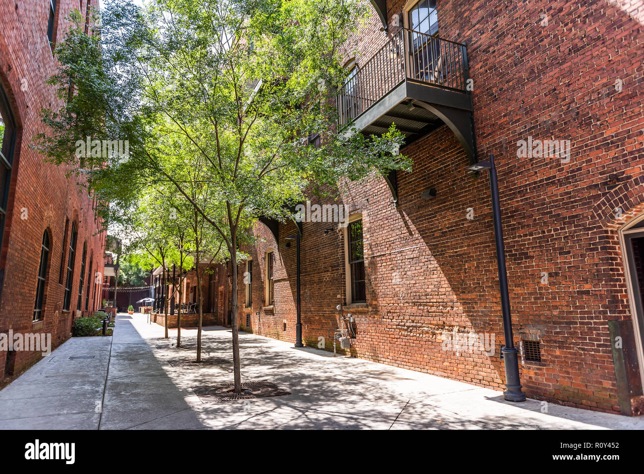 Montgomery, USA Brick buildings on Alley street alleyway during day in ...
