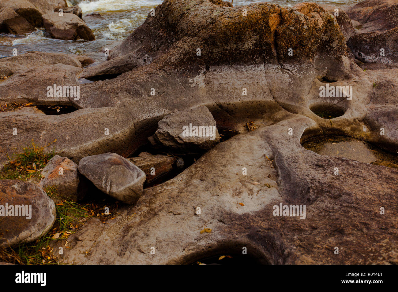 unusual forms of stones on the banks of a mountain river Stock Photo ...