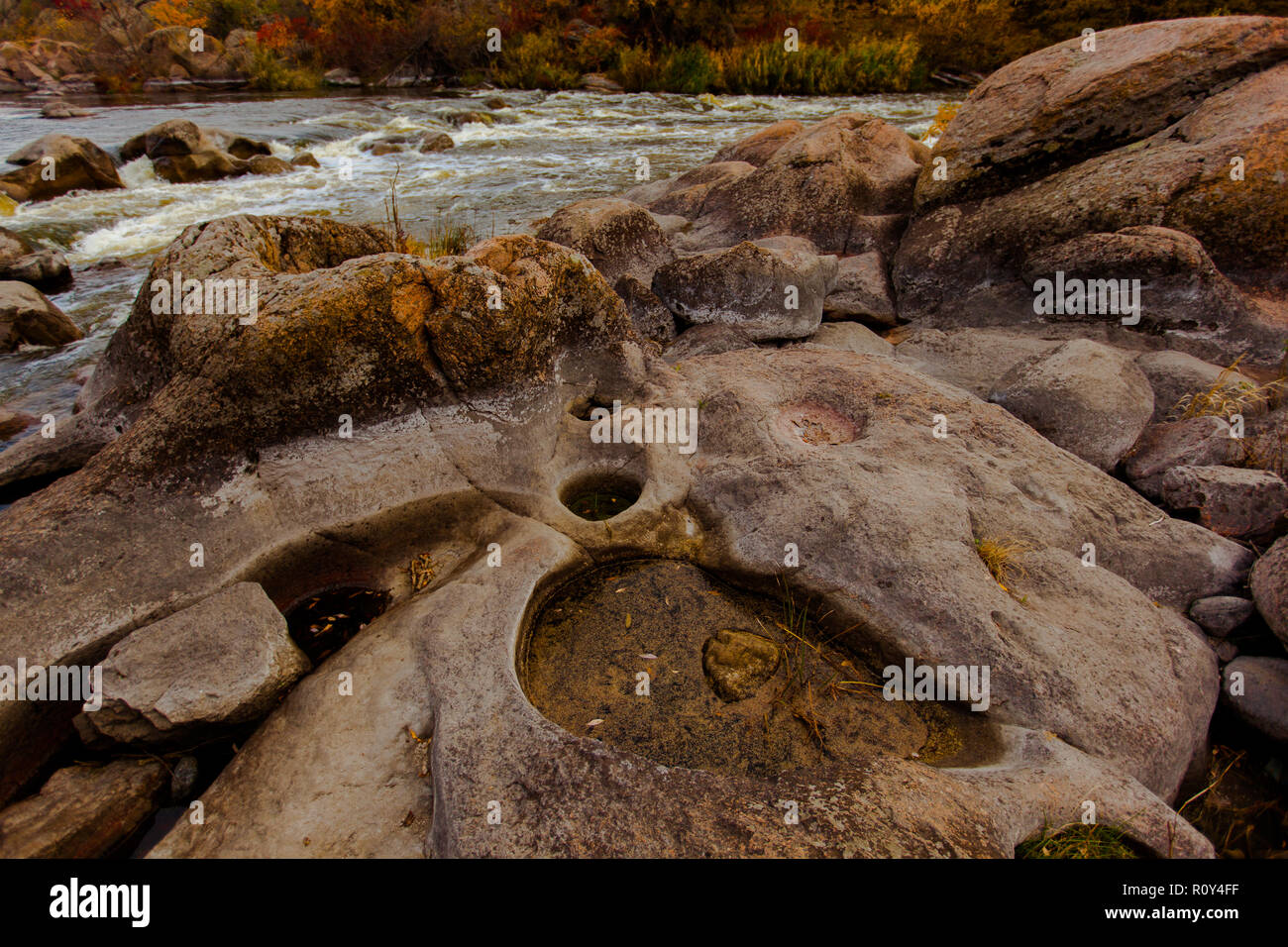unusual forms of stones on the banks of a mountain river Stock Photo ...