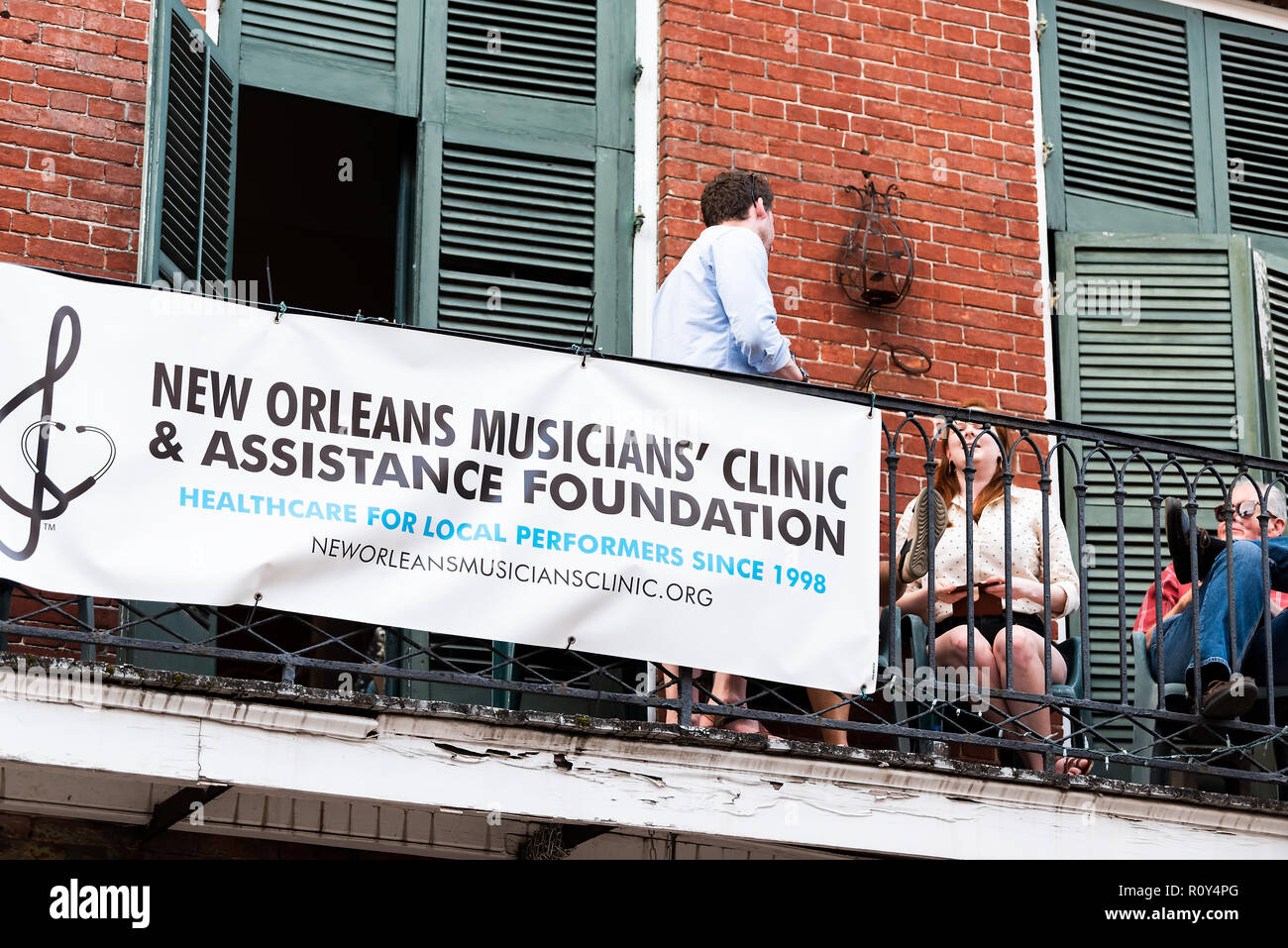 Musician on balcony hi-res stock photography and images - Alamy