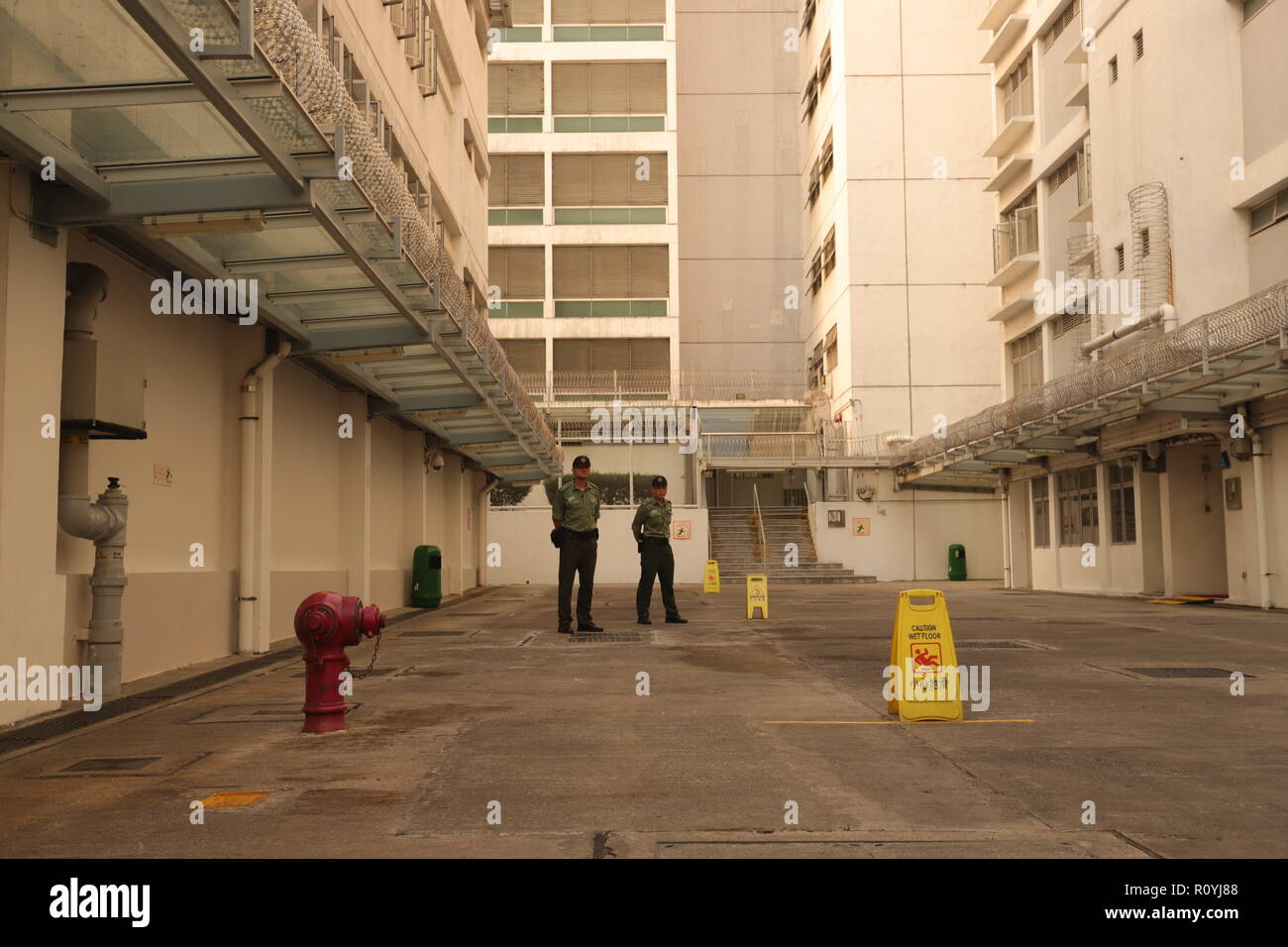 Hong Kong, CHINA. 8th Nov, 2018. Prison wardens are seen here standing ...
