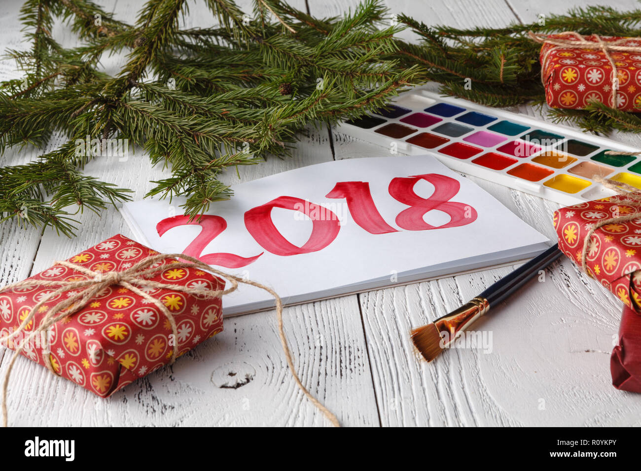 Drawing new year 2018 with painting brush Stock Photo - Alamy