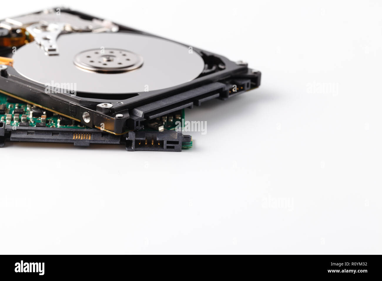 Close up inside of computer hard disk drive HDD on white background ...