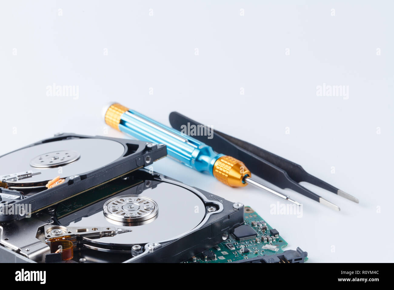 repair hard drive concept on white background with tools Stock Photo ...